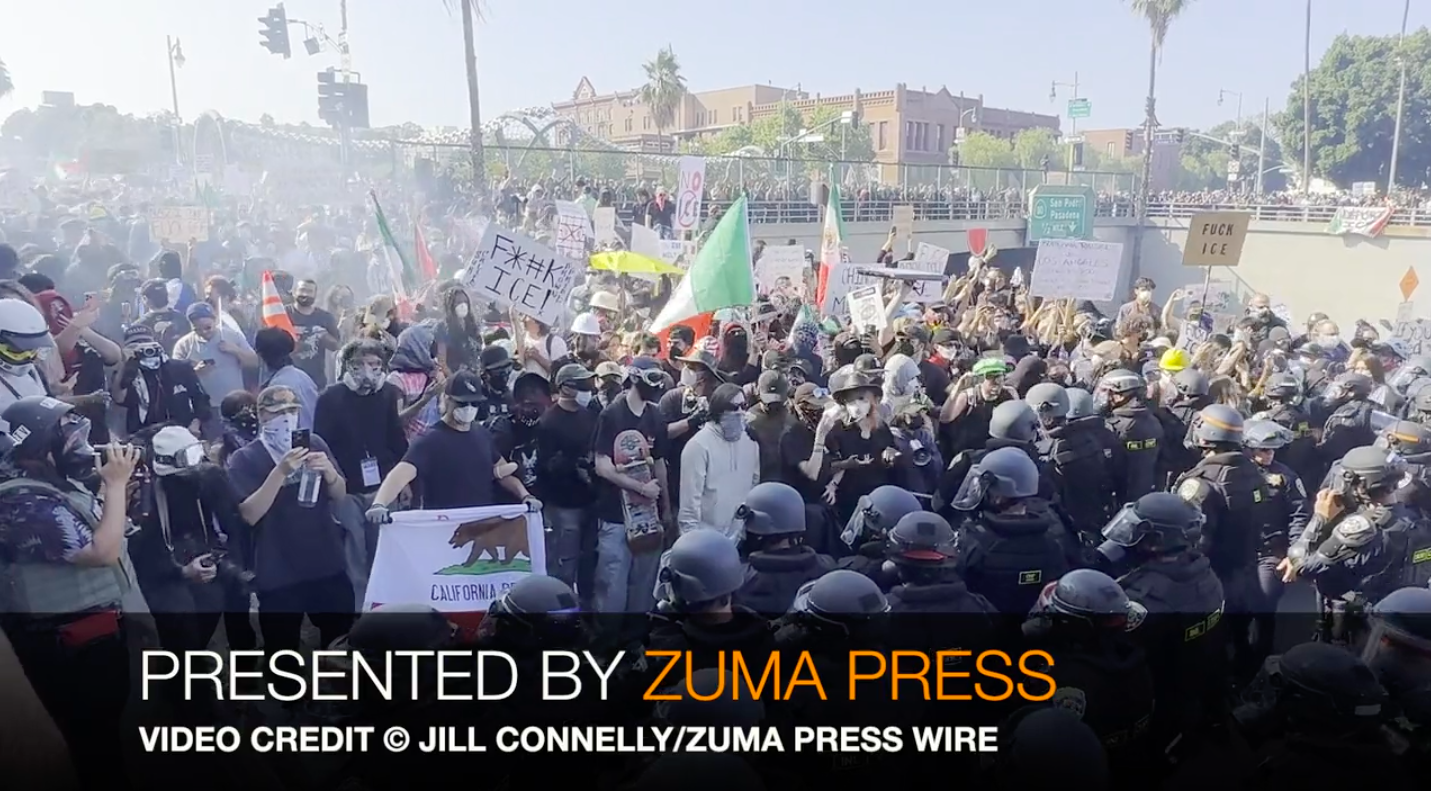 ZUMA Video: ICE Raid Protesters Stand Face to Face with Police in LA ...