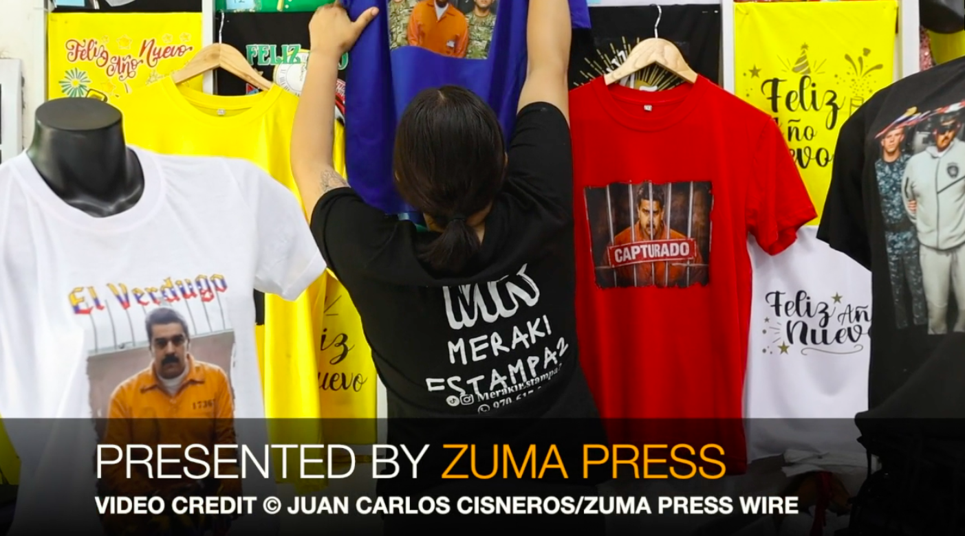ZUMA Video: T- Shirts for sale with images of a captured President ...